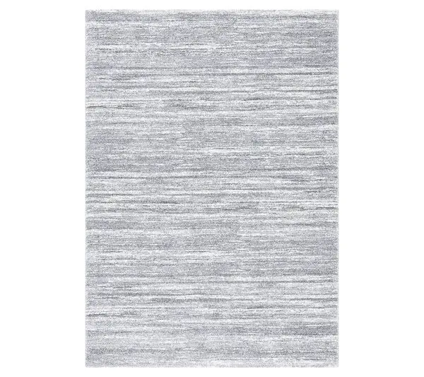 SAFAVIEH Cyrus 128 Series 4'5' X 6'5' Shag Rug - One-color
