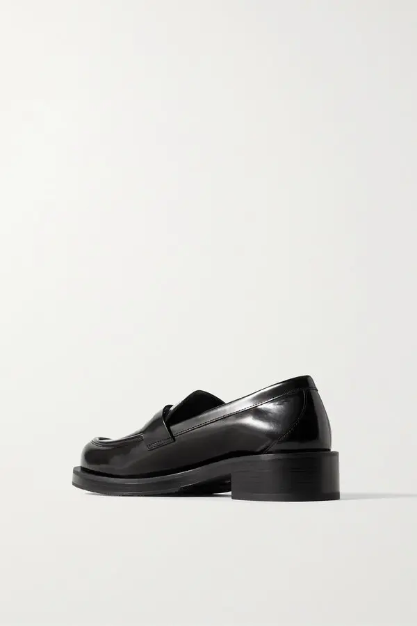 STUART WEITZMAN Palmer Glossed-leather Loafers