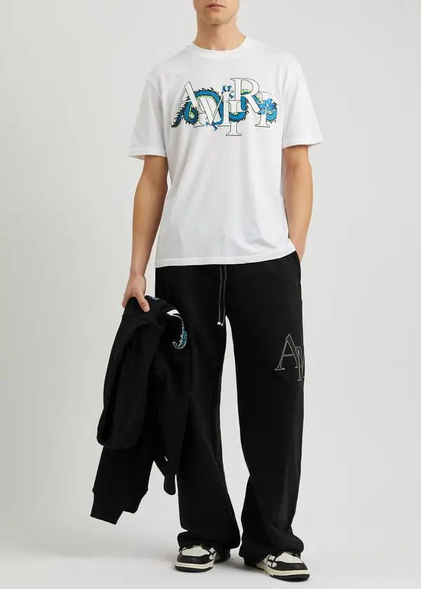 Amiri Logo-appliquéd Cotton Sweatpants