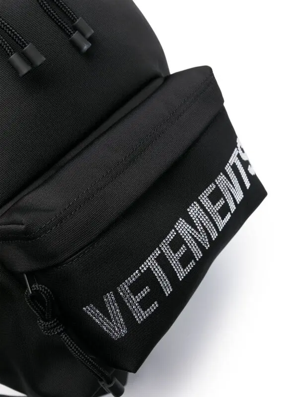 Vetements Crystal-Embellished Logo Backpack In Black - 40% Off