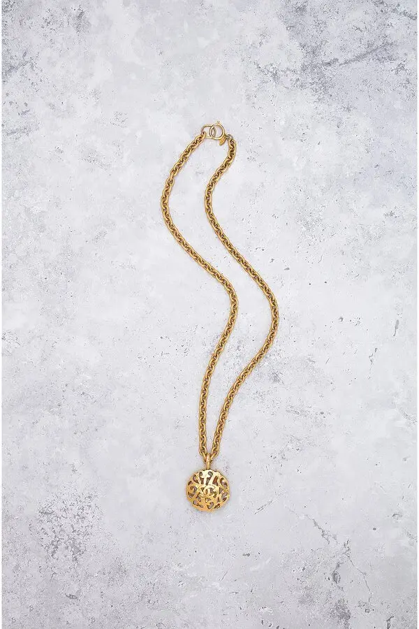 Chanel Coco Mark Necklace In Metallic - Gold | Editorialist display picture 3