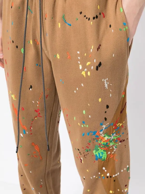 MOSTLY HEARD RARELY SEEN Warped Paint-embroidered Track Pants