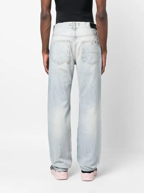 Amiri Logo-embroidered Ripped Jeans