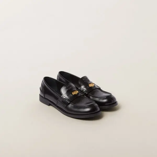 Miu Miu Brushed Leather Penny Loafers - Black | Editorialist