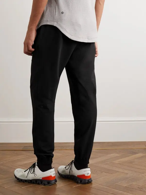 Lululemon License To Train Slim-fit Tapered Stretch Recycled-shell Track Pants - Black