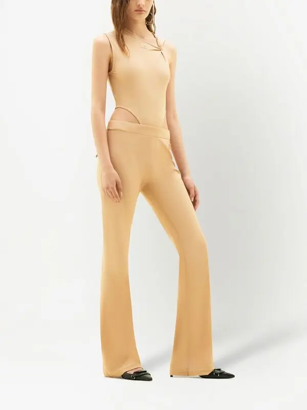COURREGES Flared-leg Trousers With Embroidered Logo - Neutrals