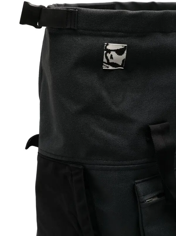 Gr10k Buckle-Fastening Waterproof Backpack In Black - 50% Off