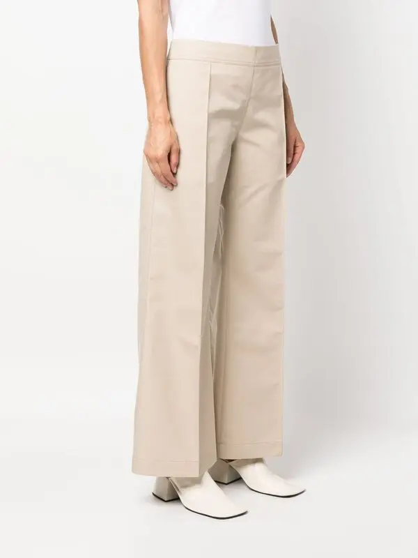 Studio Nicholson Acapulco Flared Trousers - Neutrals