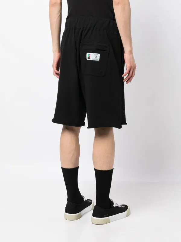 UNDERCOVERISM Slogan-print Track Shorts