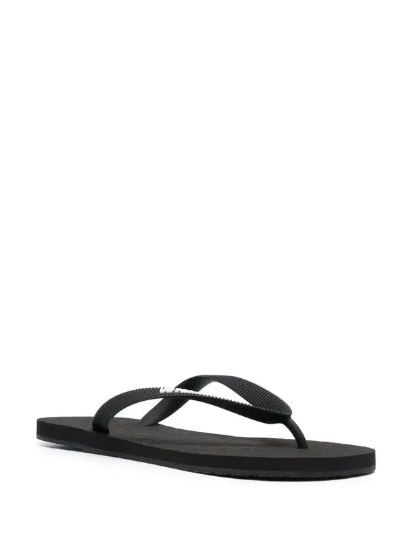 Vetements Logo-Embossed Flip Flops In Black - 61% Off | Editorialist