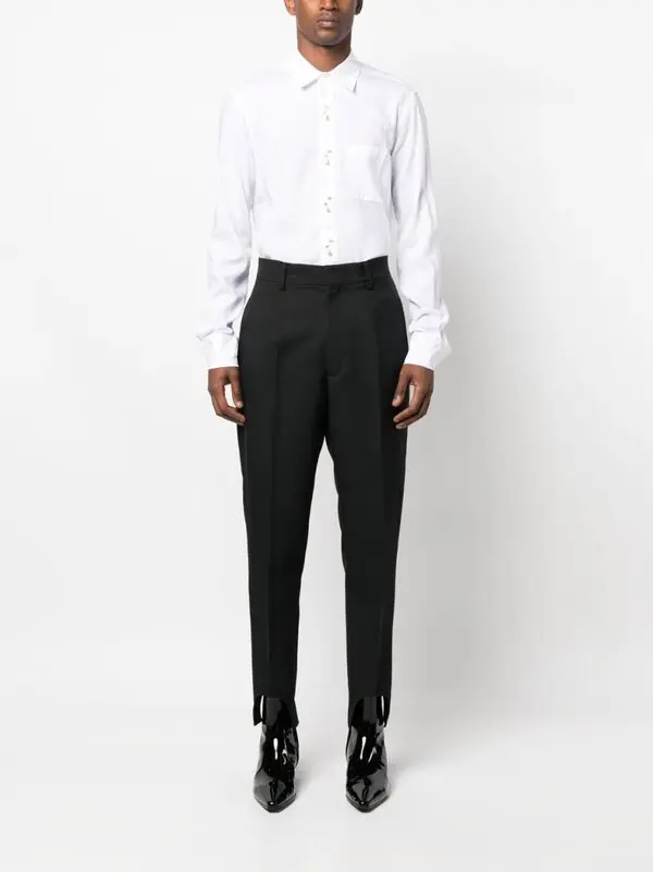 Random Identities Tapered Stirrup Trousers