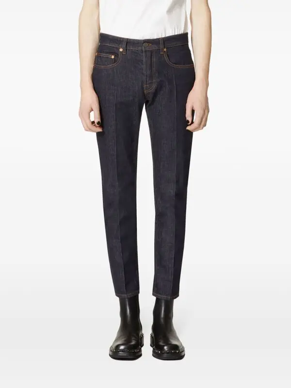 Valentino Garavani Logo-appliqué Tapered-leg Jeans