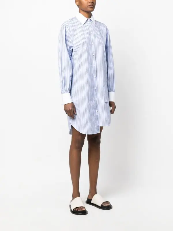 moschino dress shirt Lightweight cotton poplin with goose print oversized cut reflecting current trends * Design by the iconic Moschino branda guarantee of uniqueness and prestige Moschino White Cotton Logo Printed