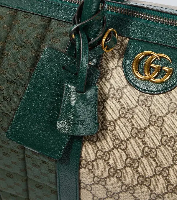 Gucci Mini Gg Small Leather-trimmed Duffel Bag