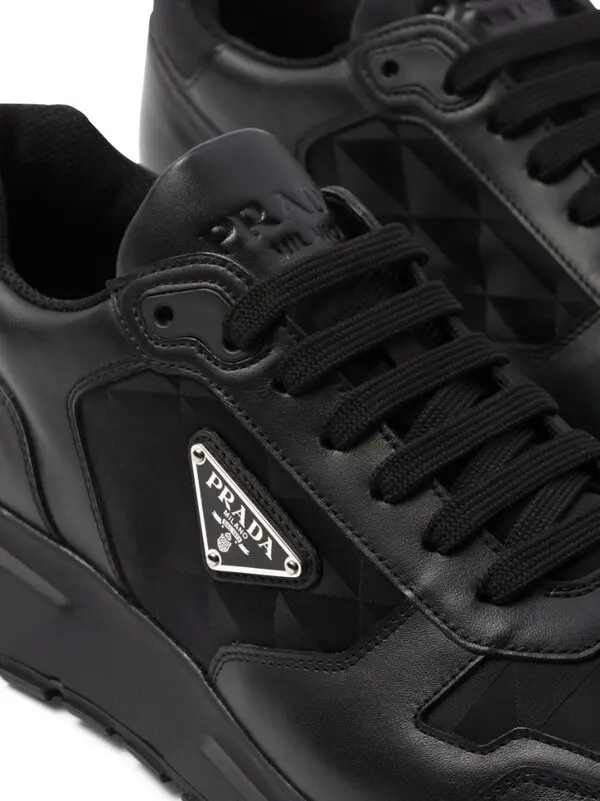 Prada Logo-Jacquard Leather Sneakers - Black | Editorialist