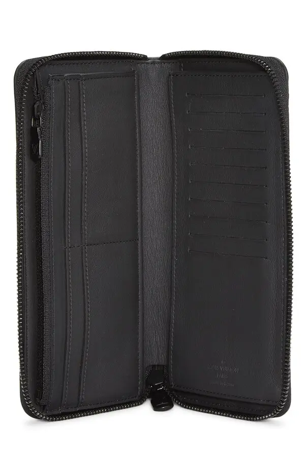 LOUIS VUITTON Monogram Shadow Zippy Vertical Wallet