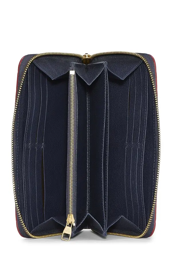 LOUIS VUITTON Bleu Infini Monogram Empreinte Zippy Wallet