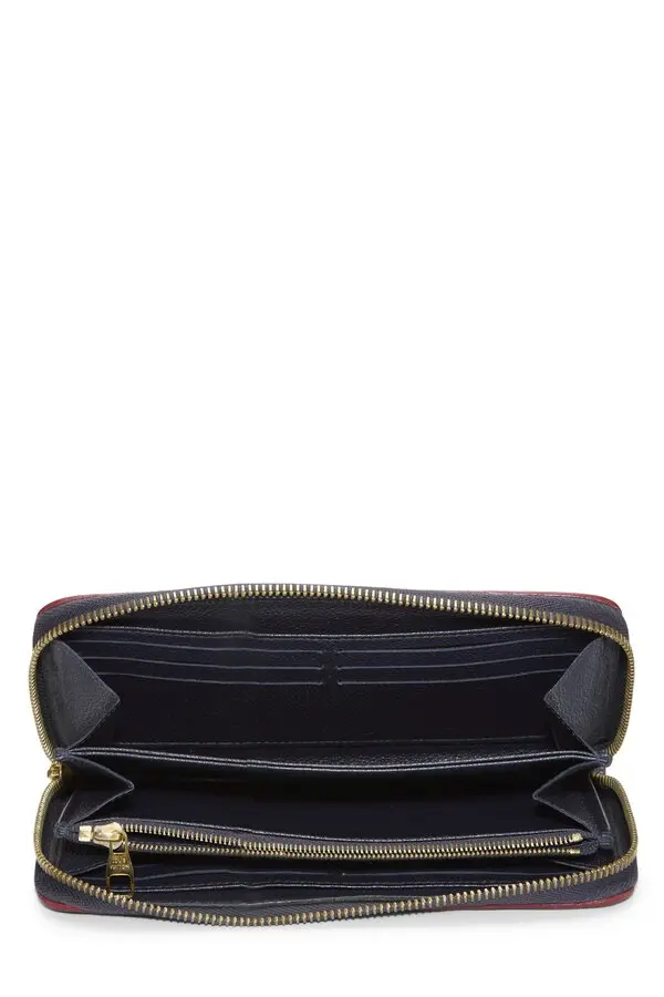 LOUIS VUITTON Bleu Infini Monogram Empreinte Zippy Wallet