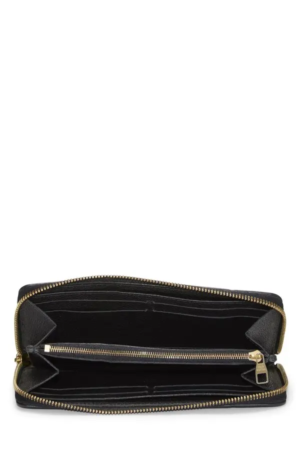LOUIS VUITTON Monogram Empreinte Clemence Wallet