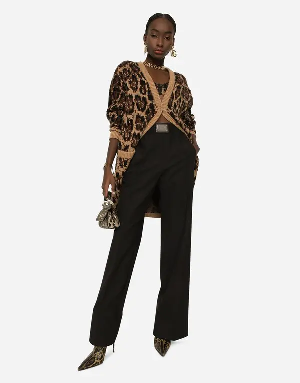 Dolce & Gabbana Flared Wool Pants With Logo Tag