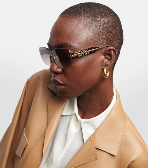 Fendi Shield Logo Sunglasses In Brown - 30% Off | Editorialist display picture 1