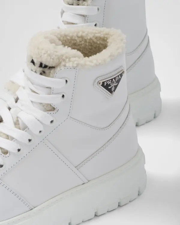 Prada Leather And Shearling High-Top Sneakers - White | Editorialist