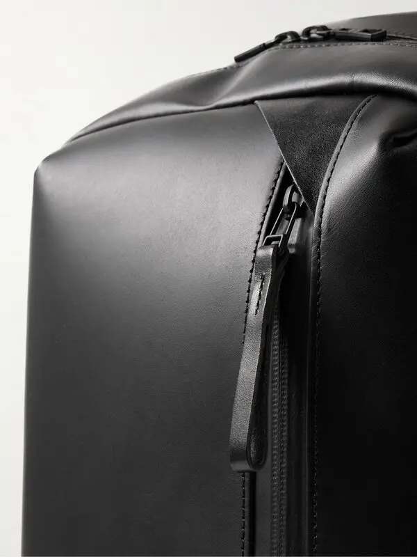 appliqud leather backpack Cognac Brown Convertible Shoulder Bag Its large pockets are sure to meet your carrying needs and the main compartment is further secured with drawstring Leather Backpack - Custom Made