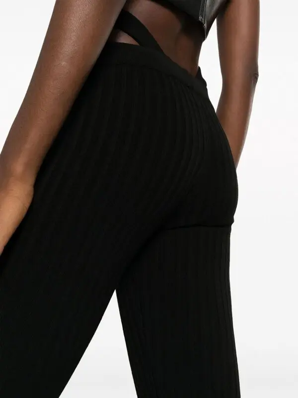 ANDREĀDAMO Ribbed-knit Flared Trousers - Black
