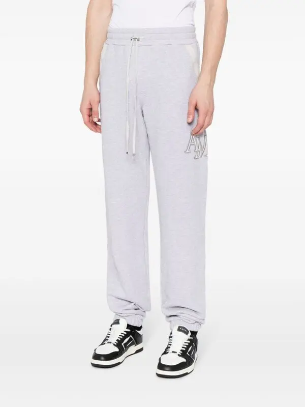 Amiri Staggered Logo-embroidered Track Pants