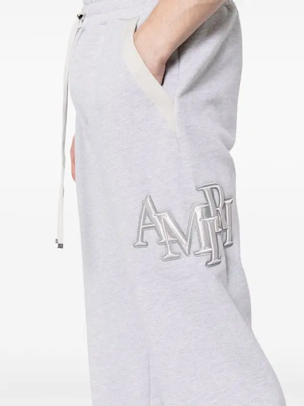 Amiri Staggered Logo-embroidered Track Pants