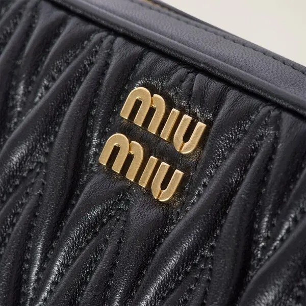 Miu Miu Matelassé Nappa Leather Pouch - Black | Editorialist