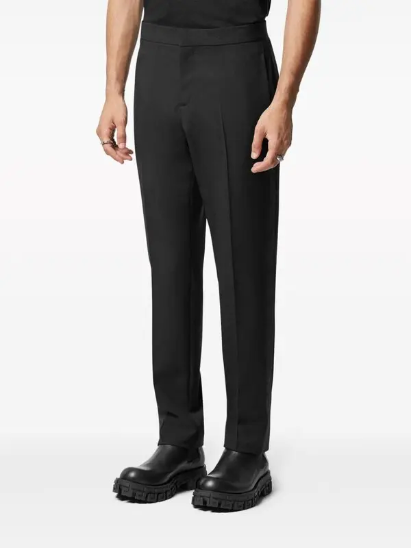 Versace Logo Appliqué Tapered Chino Trousers
