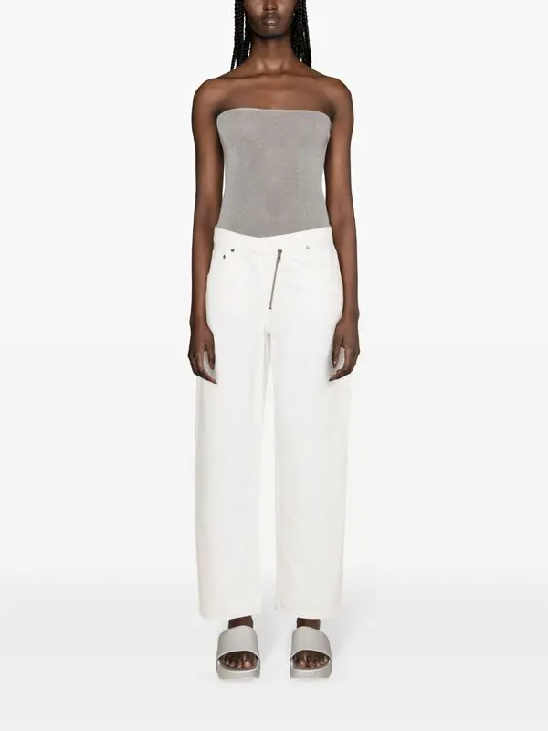 FRAME Angled Zipper Tapered-leg Jeans