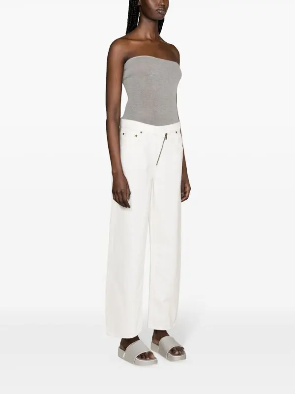 FRAME Angled Zipper Tapered-leg Jeans