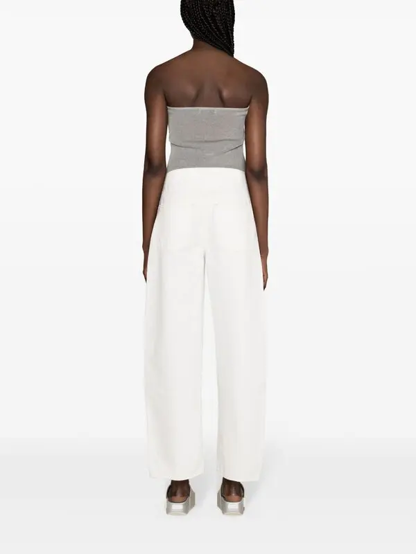 FRAME Angled Zipper Tapered-leg Jeans