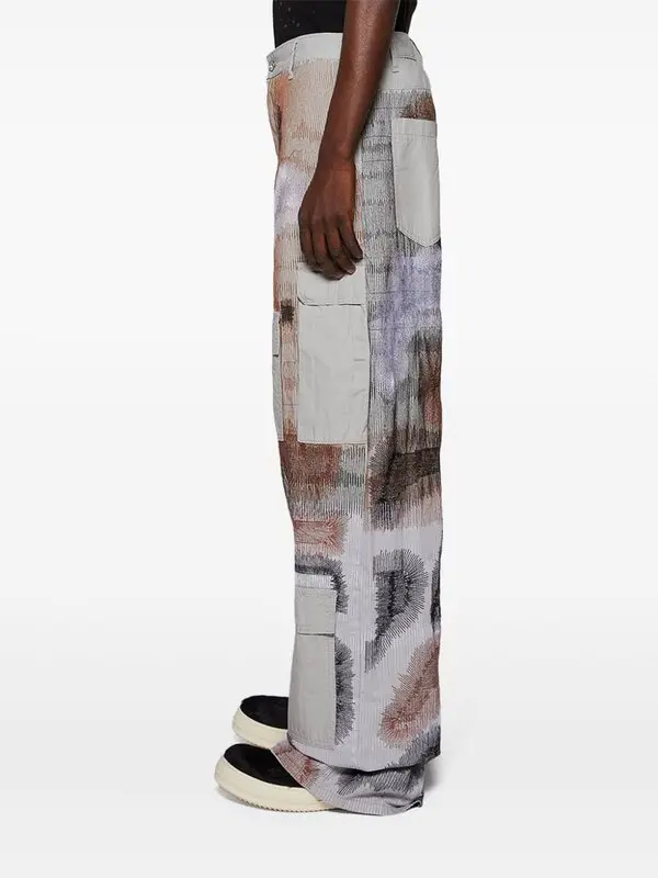 WHO DECIDES WAR Darning Trousers