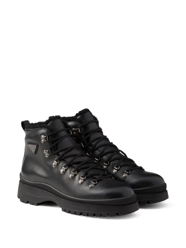Prada Brixxen Leather Boots - Black