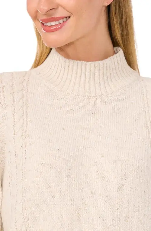 CECE DUPRAZ Metallic Mock Neck Cable Stitch Sweater