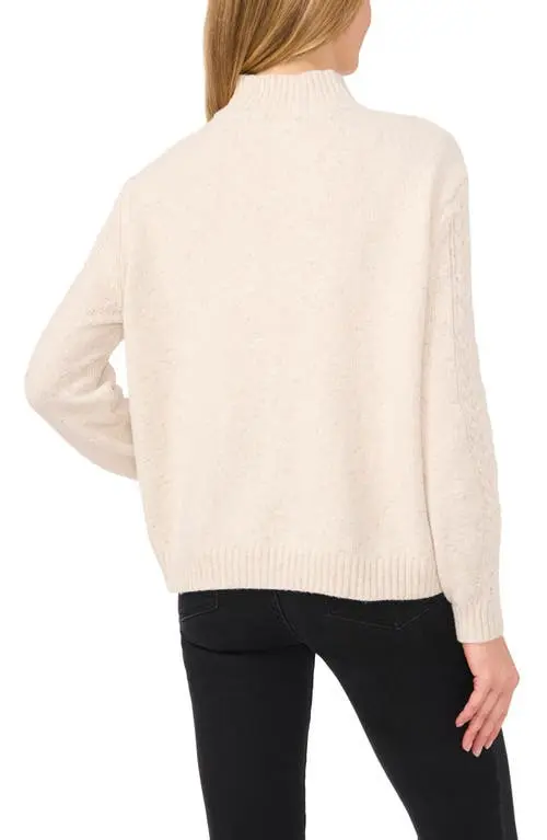 CECE DUPRAZ Metallic Mock Neck Cable Stitch Sweater