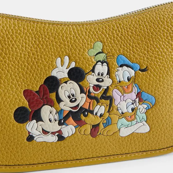 COACH Disney X Swinger Bag In Regenerative Leather With Mickey Mouse And Friends