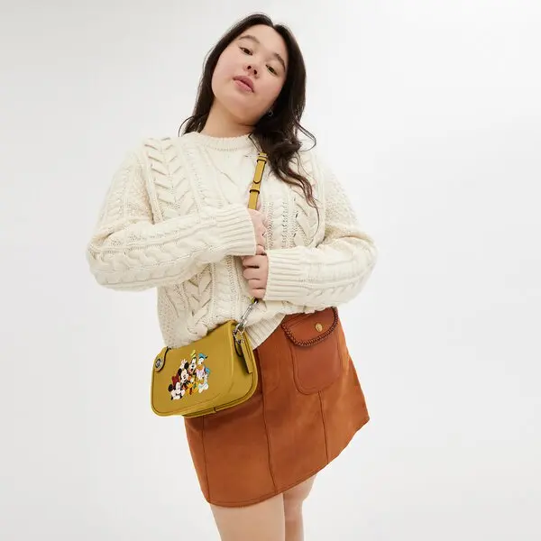 COACH Disney X Swinger Bag In Regenerative Leather With Mickey Mouse And Friends