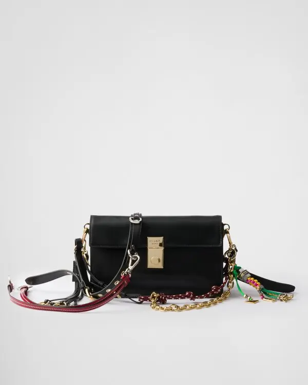 Prada Soft Sound Leather Shoulder Bag With Charms - Black