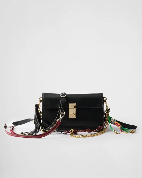 Prada Soft Sound Leather Shoulder Bag With Charms - Black