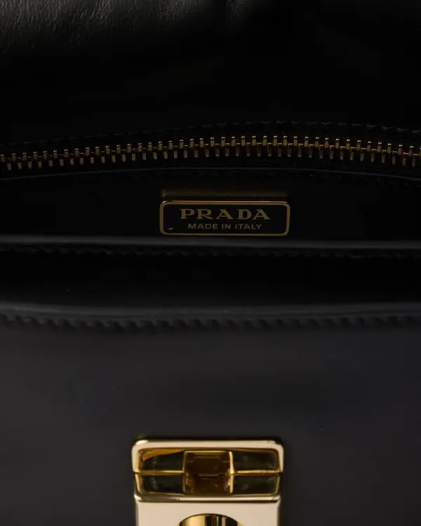 Prada Soft Sound Leather Shoulder Bag With Charms - Black