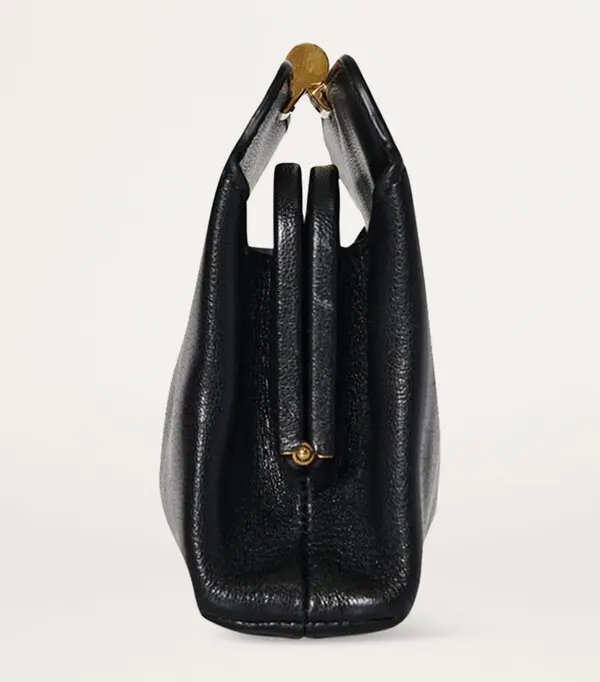The Row Amazon Leather Clutch Bag - Black | Editorialist