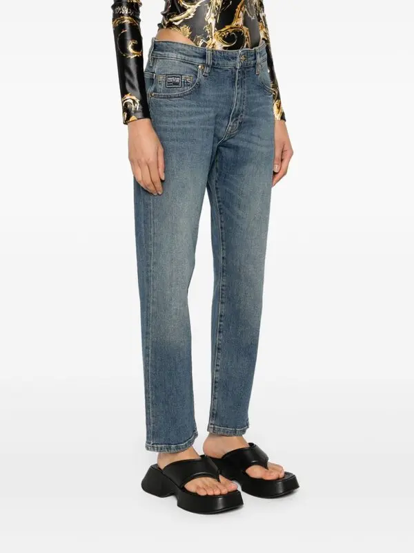Versace Logo-embroidered Slim-cut Jeans
