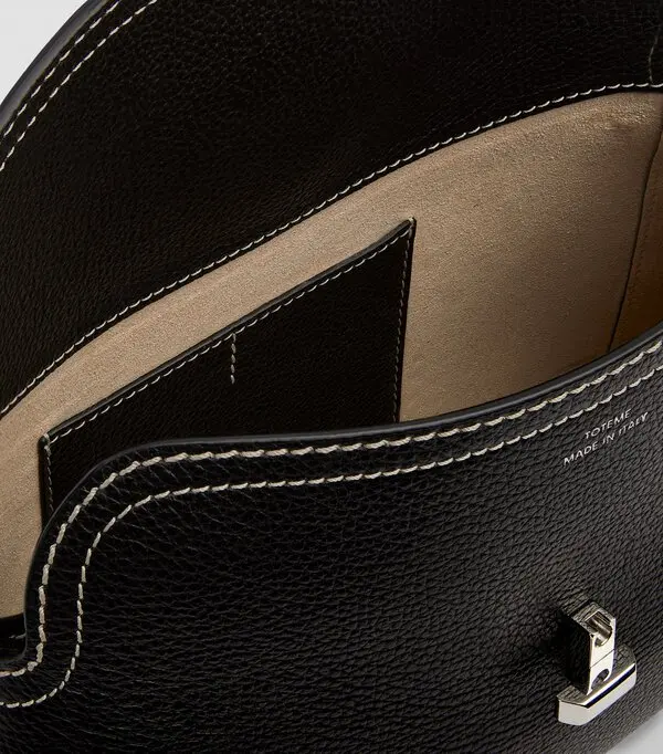 TOTÊME - Totême T-Lock Leather Clutch
