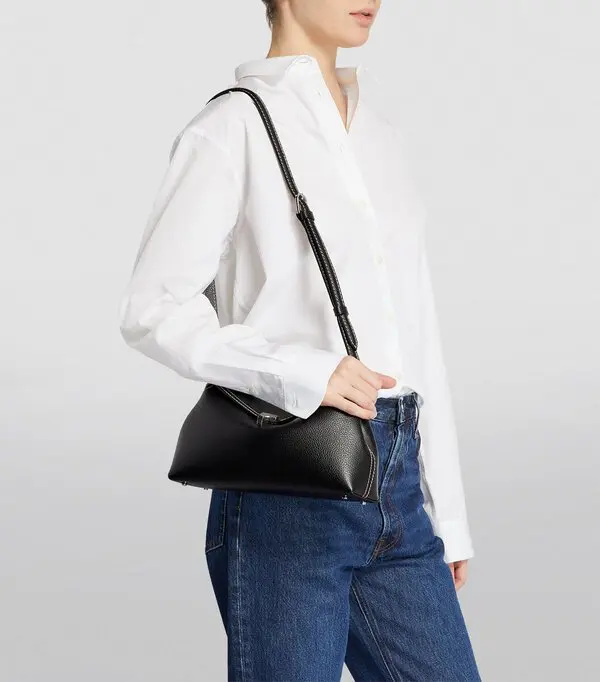TOTÊME - Totême T-Lock Leather Clutch