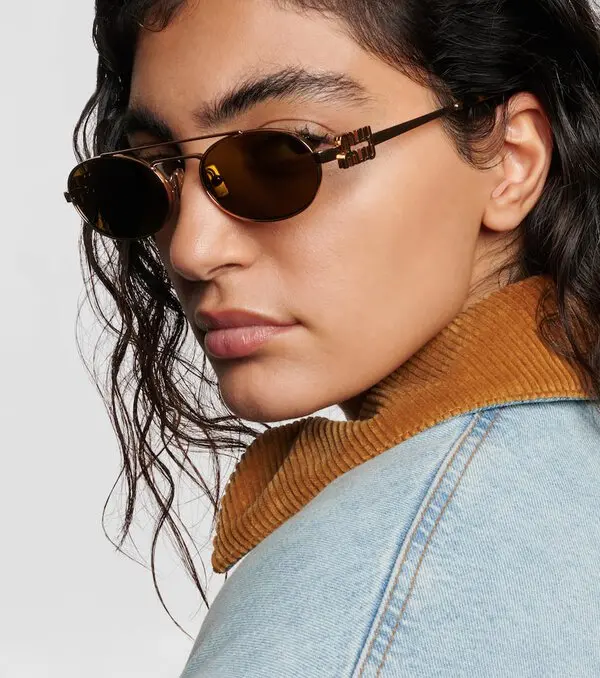 Miu Miu Oval Sunglasses With Tone Logo Detail - Gold