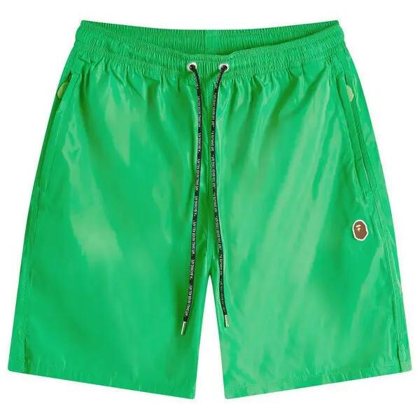 A BATHING APE Ape Head Nylon Beach Shorts - Green